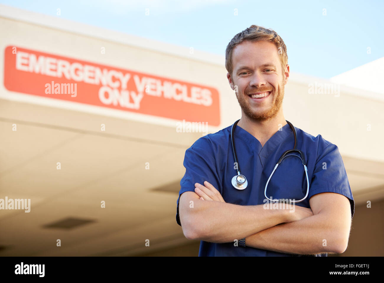 Portrait Of Male Doctor Standing Outside Hospital Stock Photo - Alamy