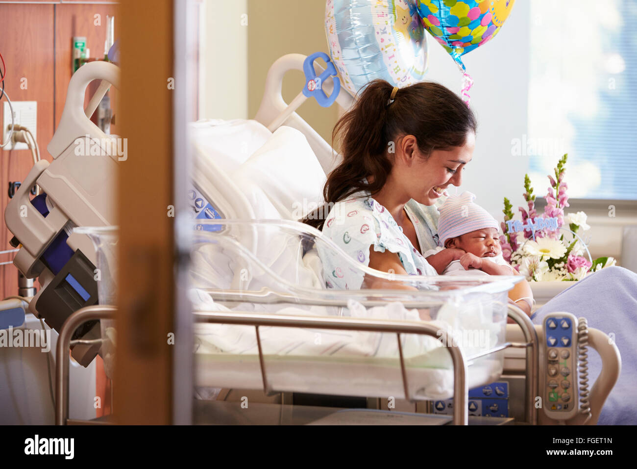 Mother With New Born Baby In Post Natal Department Stock Photo - Alamy