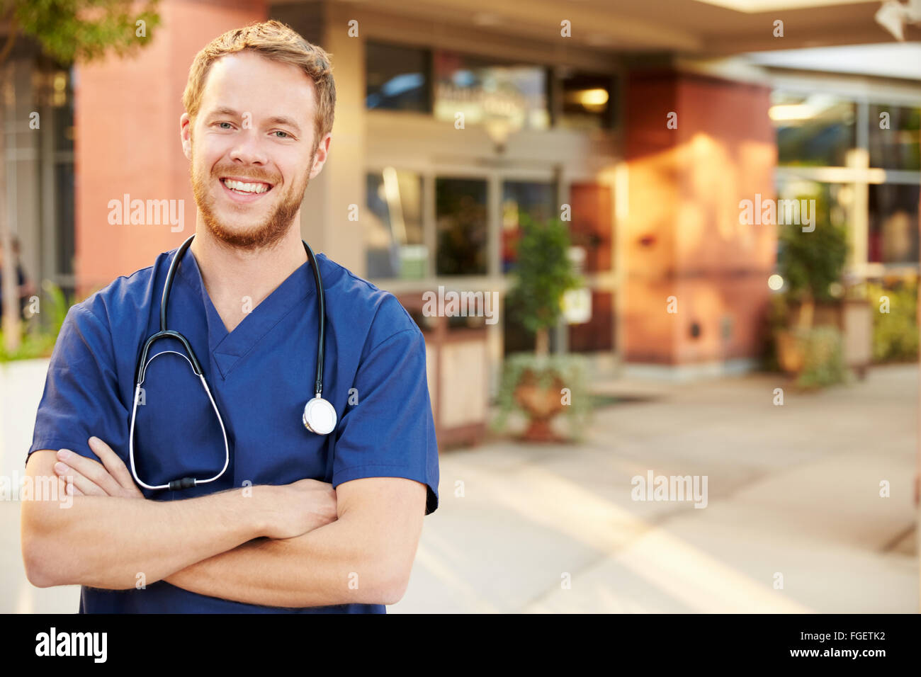 Portrait Of Male Doctor Standing Outside Hospital Stock Photo - Alamy