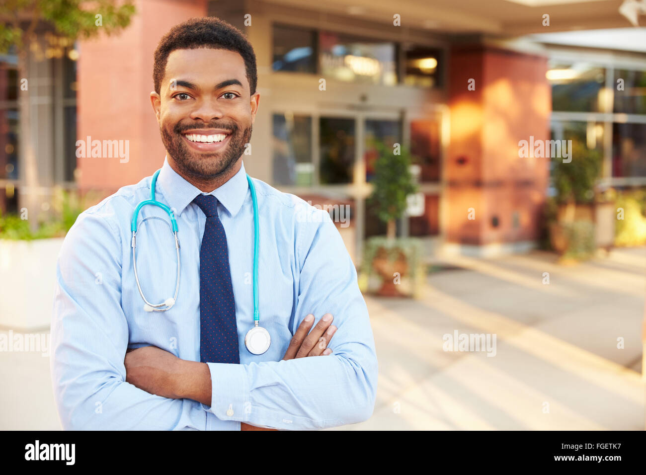 Portrait Of Male Doctor Standing Outside Hospital Stock Photo - Alamy