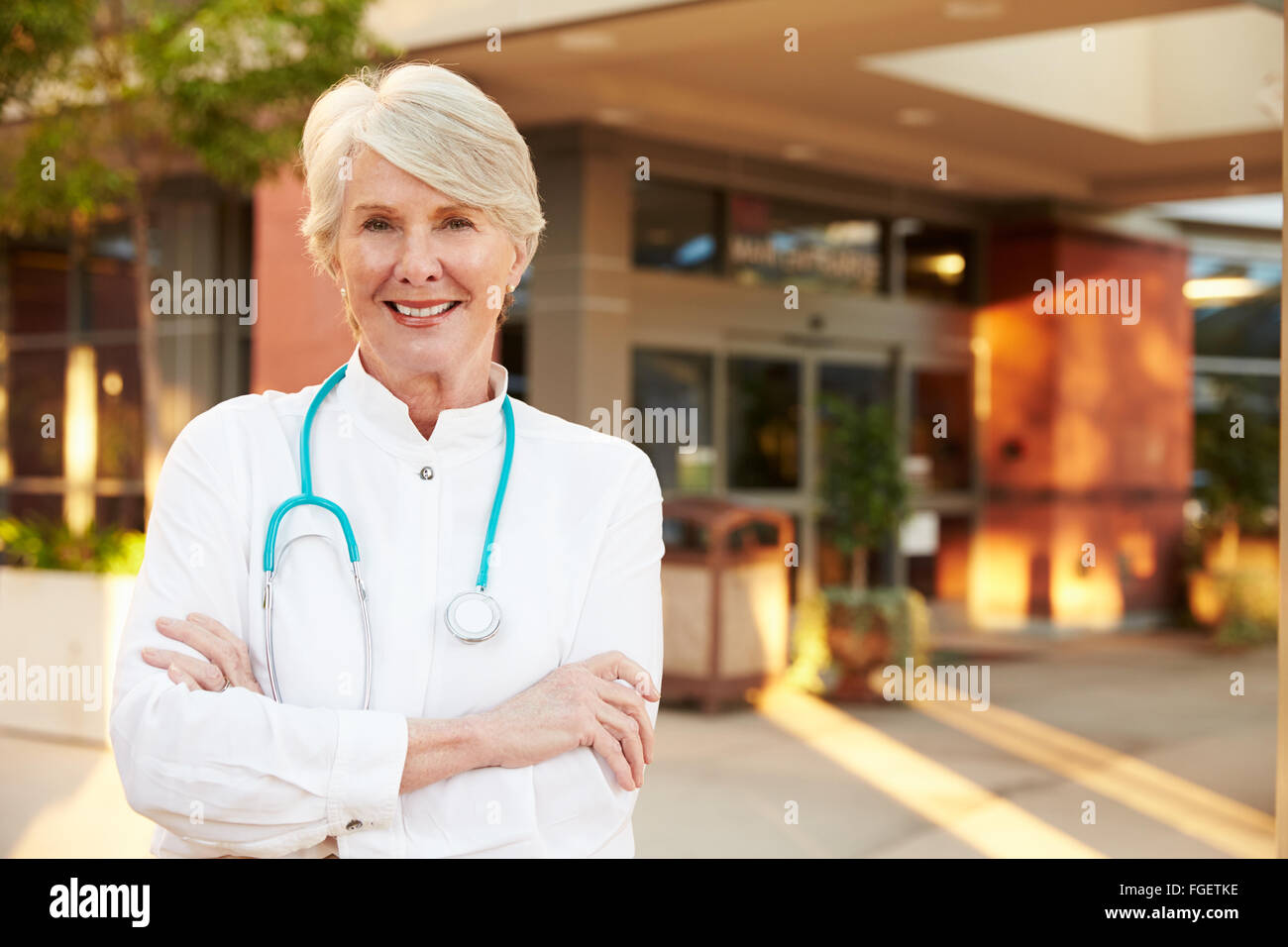 Portrait Of Female Doctor Standing Outside Hospital Stock Photo - Alamy