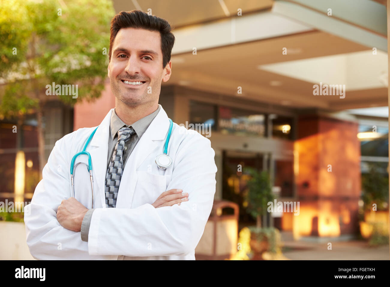 Portrait Of Male Doctor Standing Outside Hospital Stock Photo - Alamy