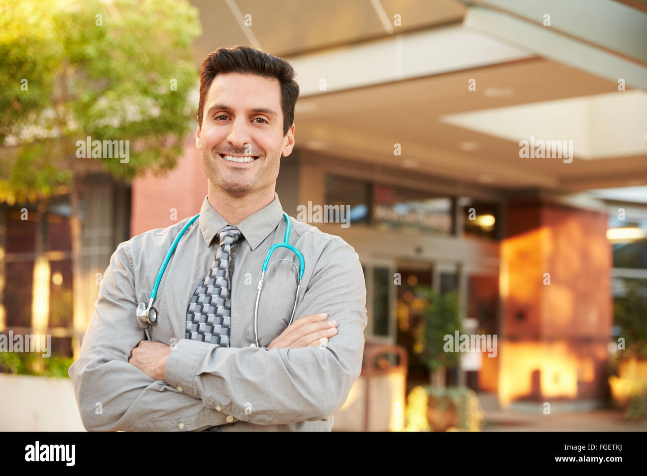 Portrait Of Male Doctor Standing Outside Hospital Stock Photo - Alamy