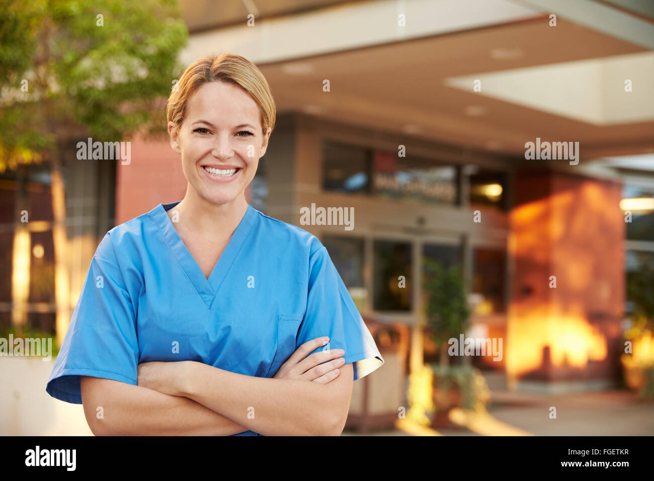 Portrait Of Female Doctor Standing Outside Hospital Stock Photo - Alamy