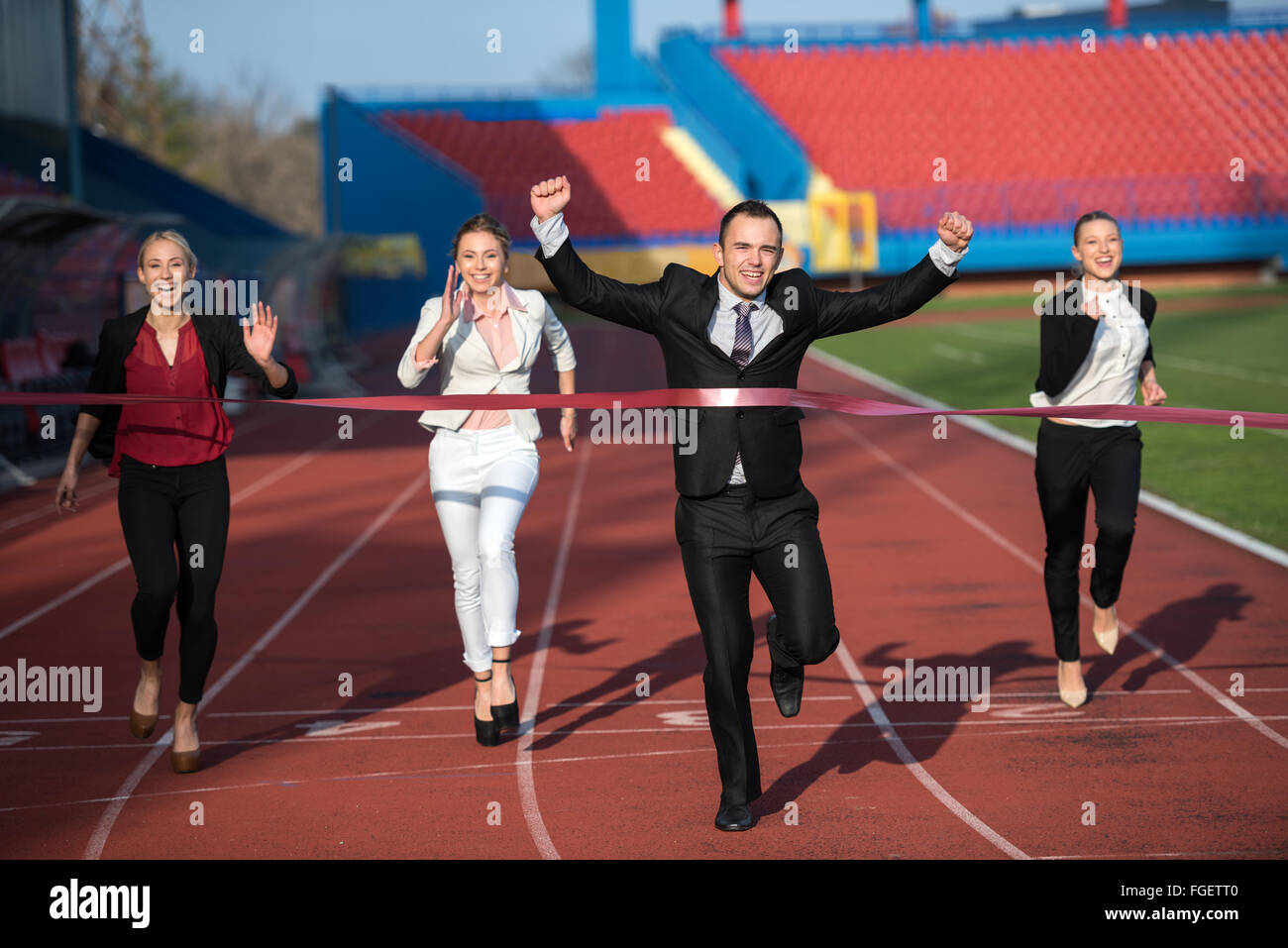 business people running on racing track Stock Photo - Alamy
