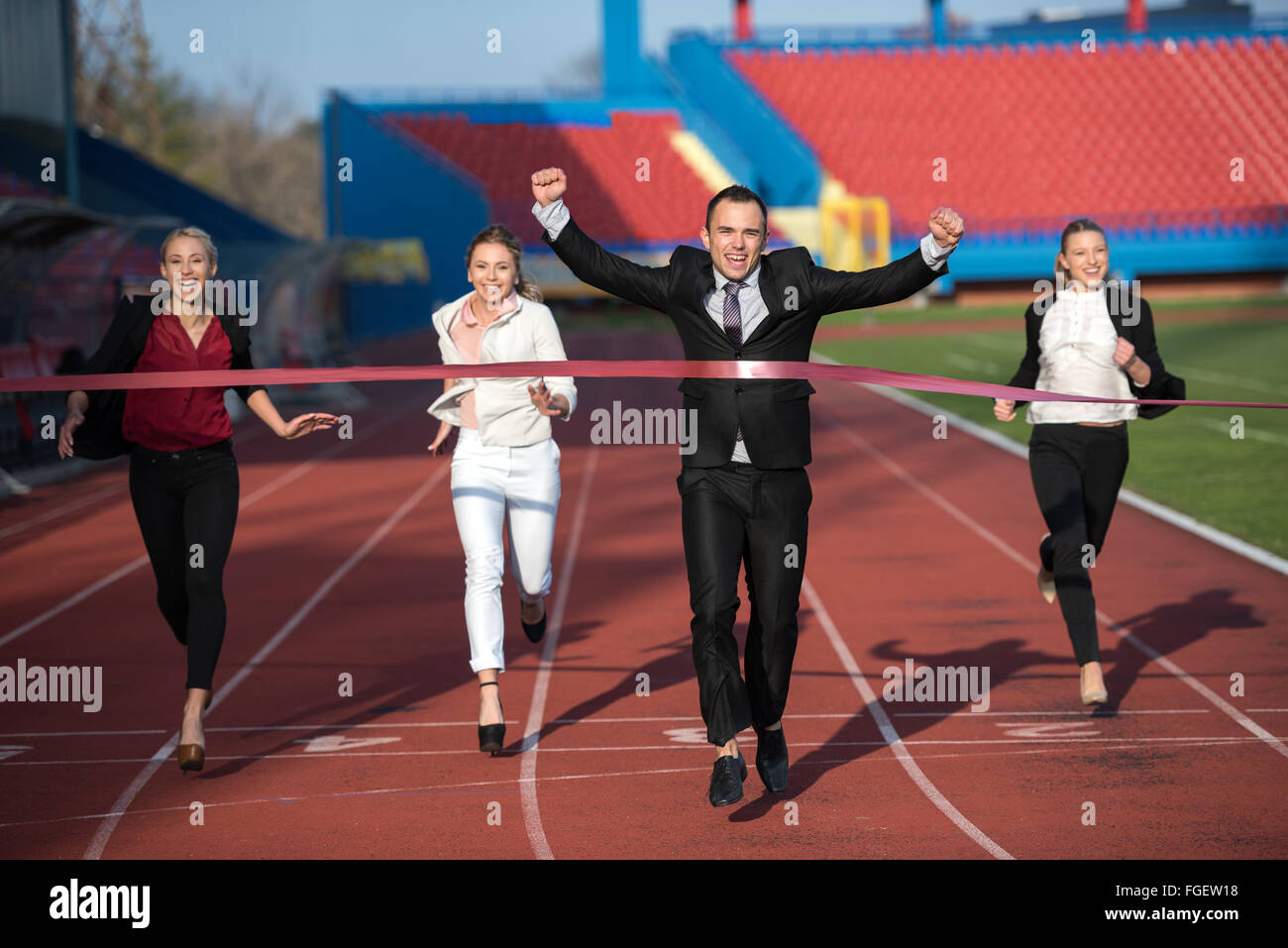 business people running on racing track Stock Photo - Alamy