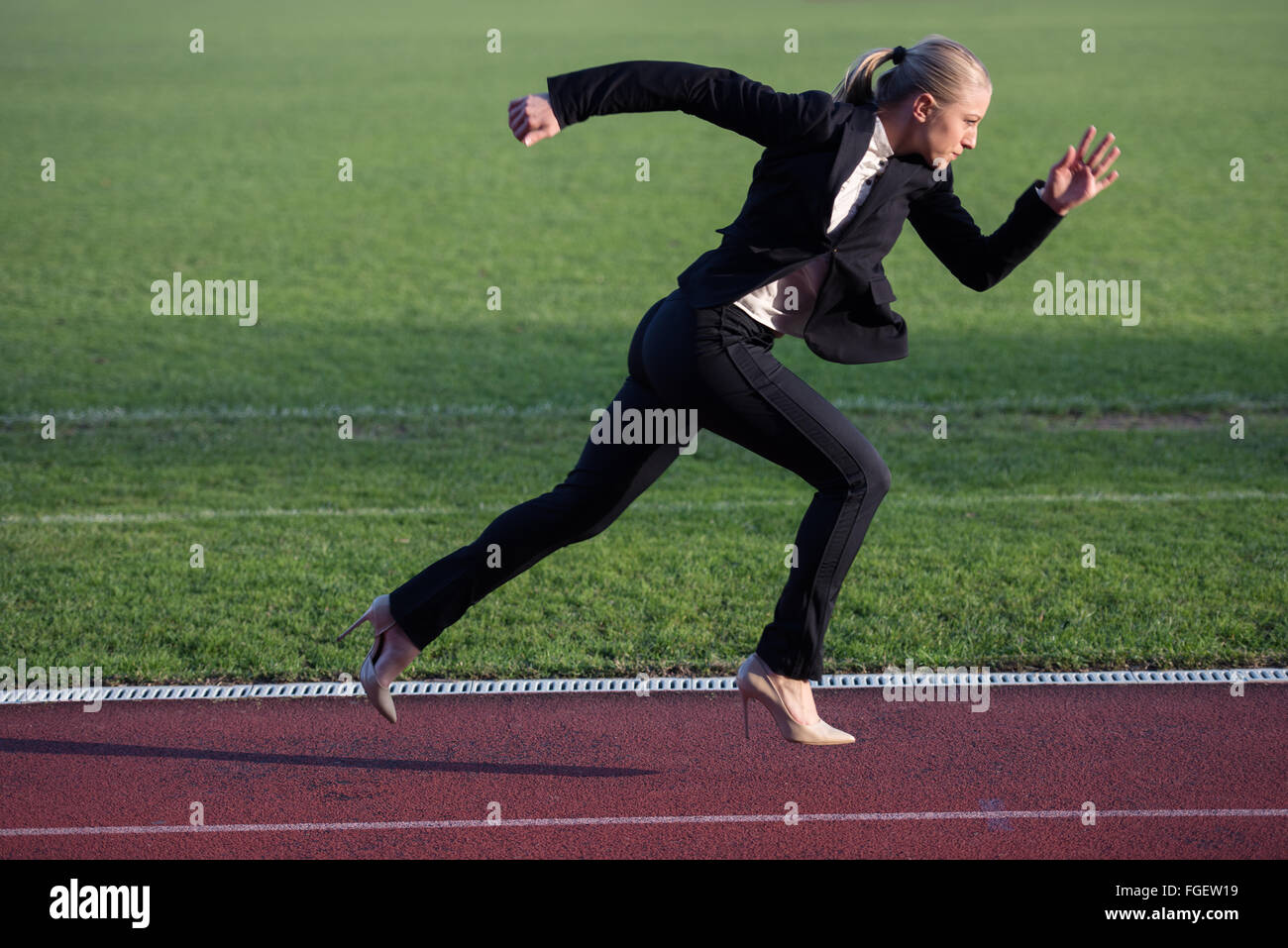 business woman ready to sprint Stock Photo - Alamy
