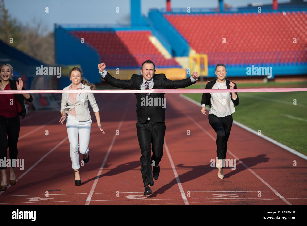 business people running on racing track Stock Photo - Alamy