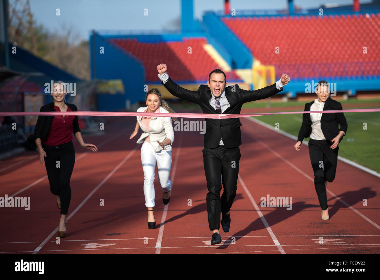 business people running on racing track Stock Photo - Alamy