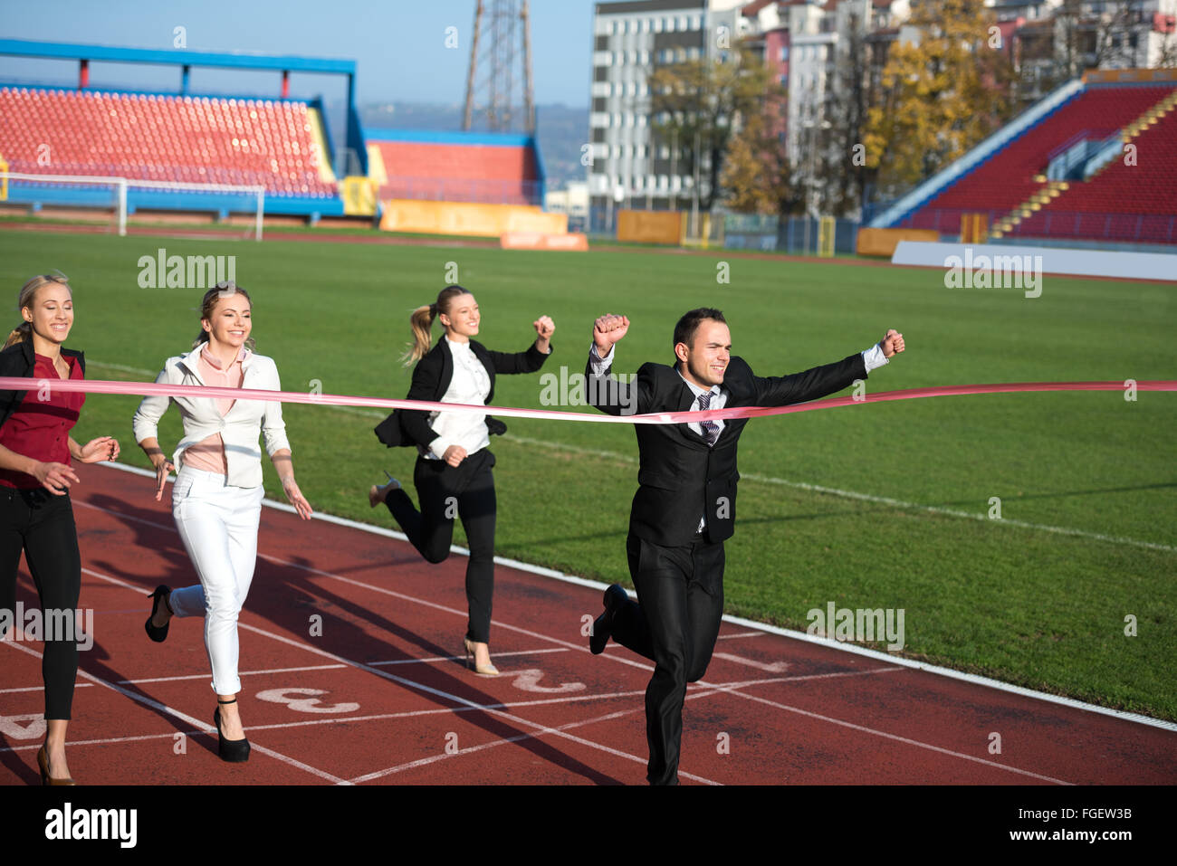 business people running on racing track Stock Photo - Alamy