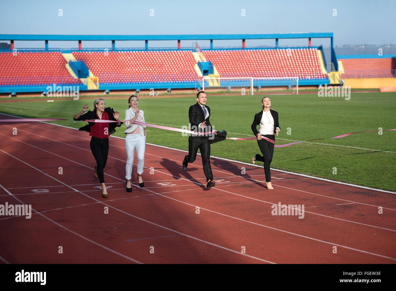 business people running on racing track Stock Photo - Alamy