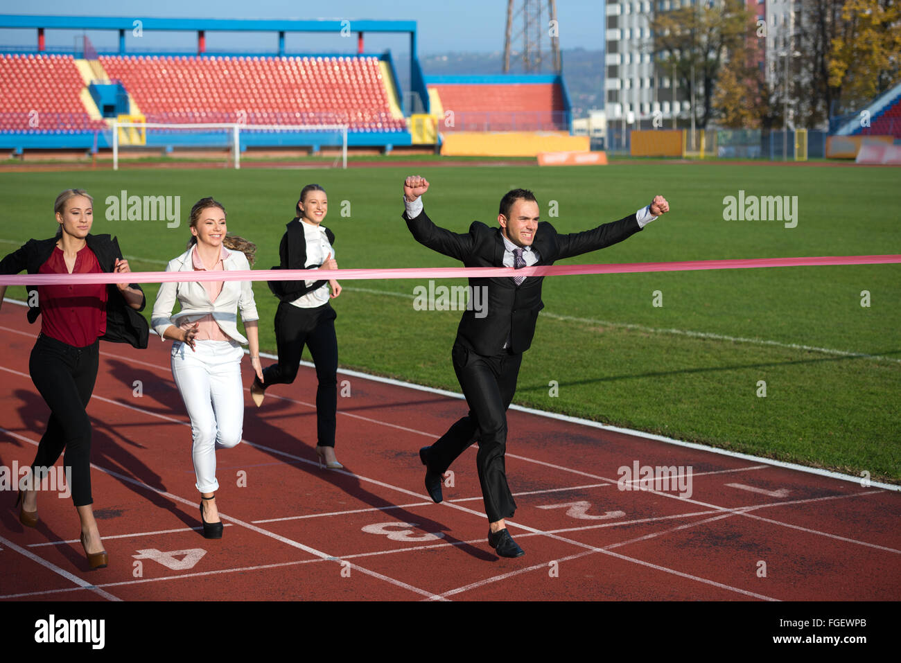 business people running on racing track Stock Photo - Alamy