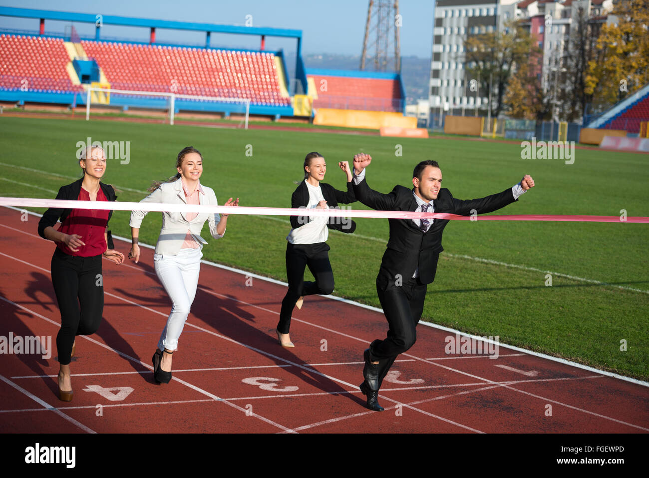 business people running on racing track Stock Photo - Alamy