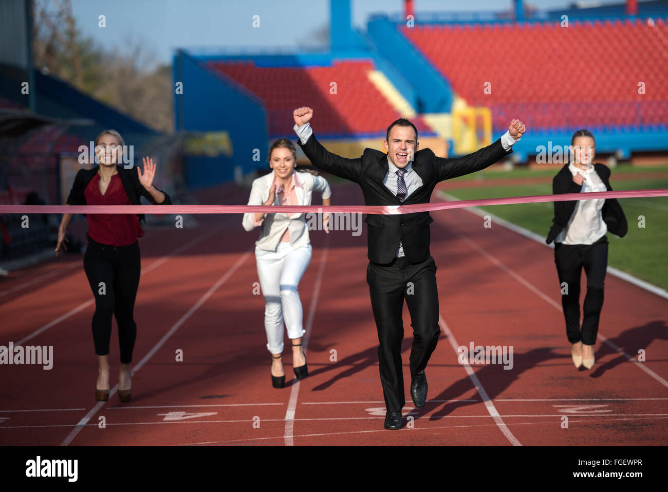 business people running on racing track Stock Photo - Alamy