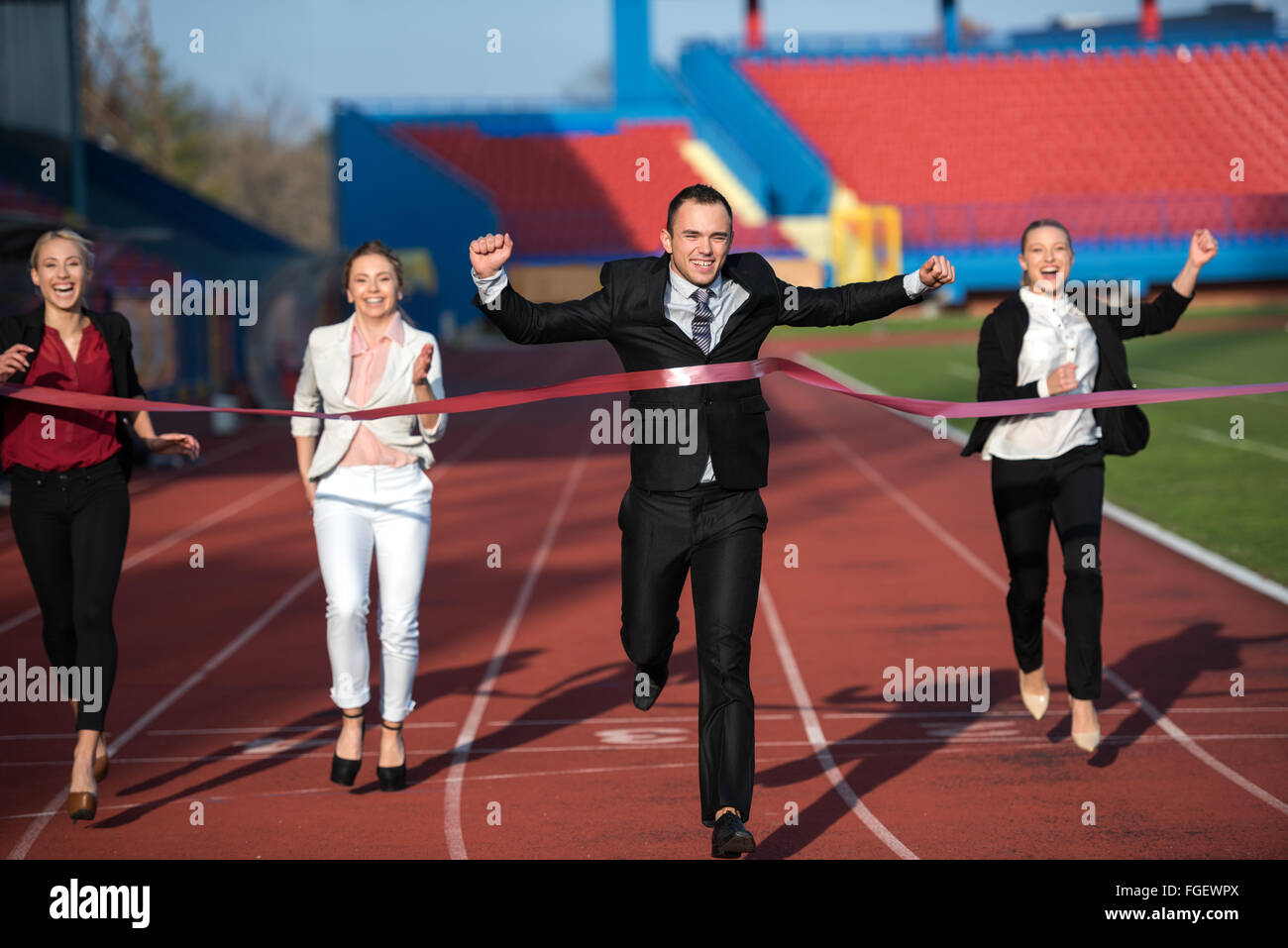 business people running on racing track Stock Photo - Alamy