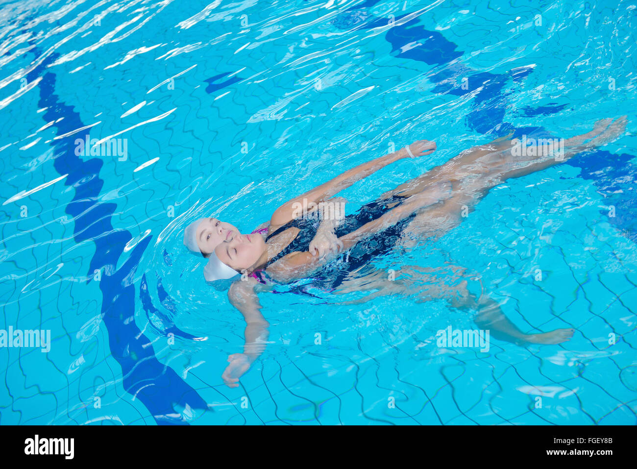 help and rescue on swimming pool Stock Photo - Alamy