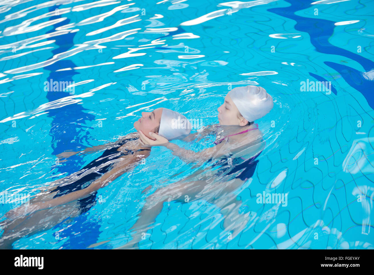help and rescue on swimming pool Stock Photo - Alamy
