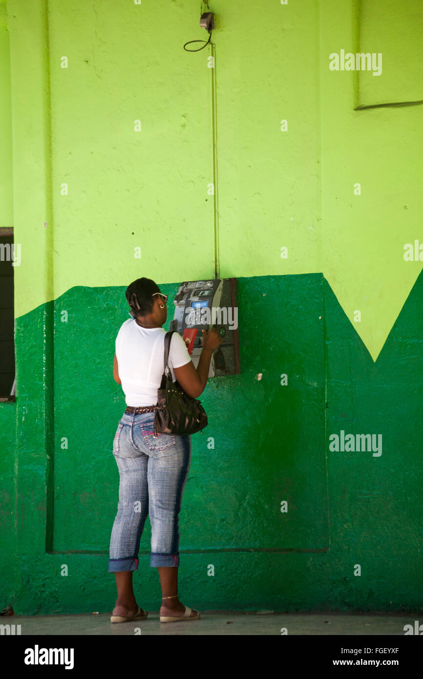 Daily life in Cuba - Cuban woman making a phone call on telephone on ...