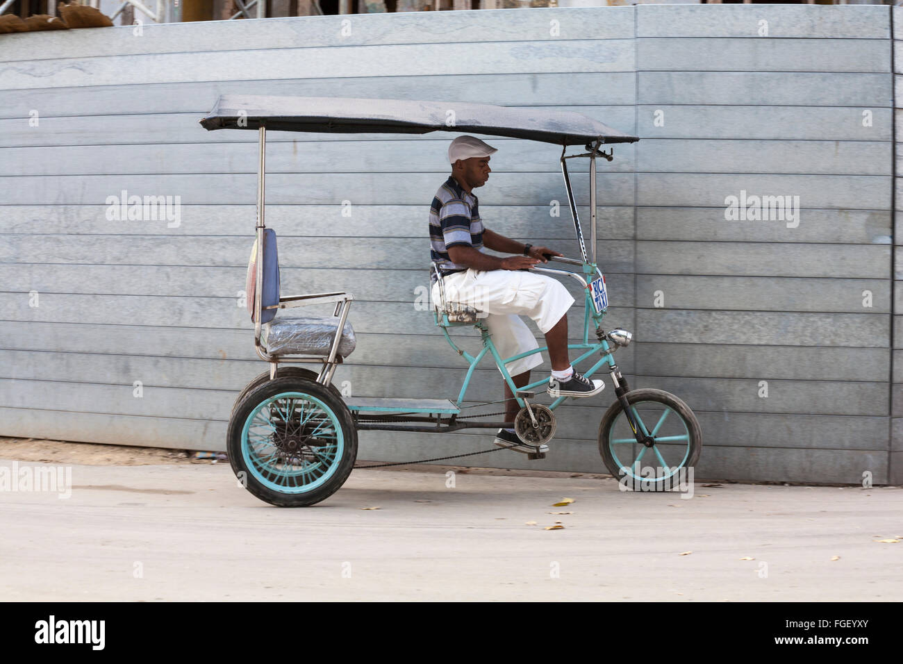 Riding three wheeler hi-res stock photography and images - Alamy