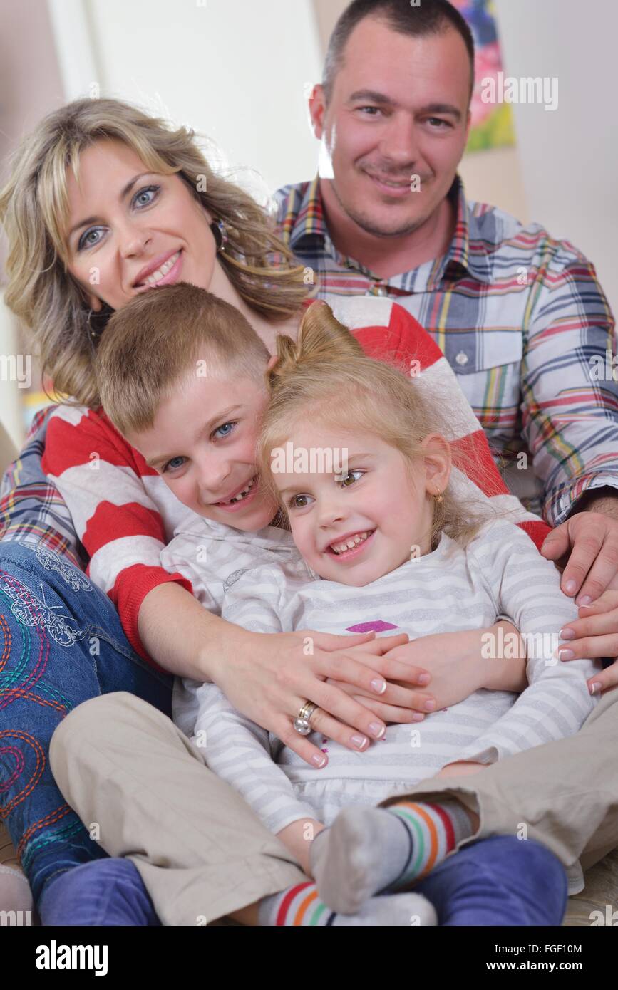 happy young family at home Stock Photo - Alamy