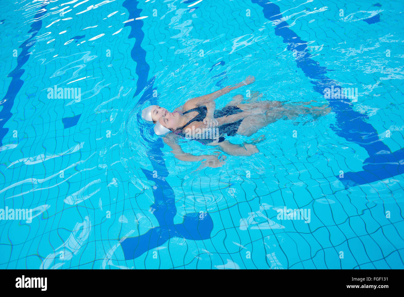 help and rescue on swimming pool Stock Photo - Alamy
