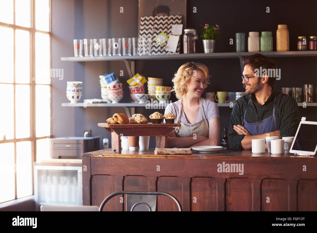 Couple Running Coffee Shop Standing Behind Counter Stock Photo - Alamy