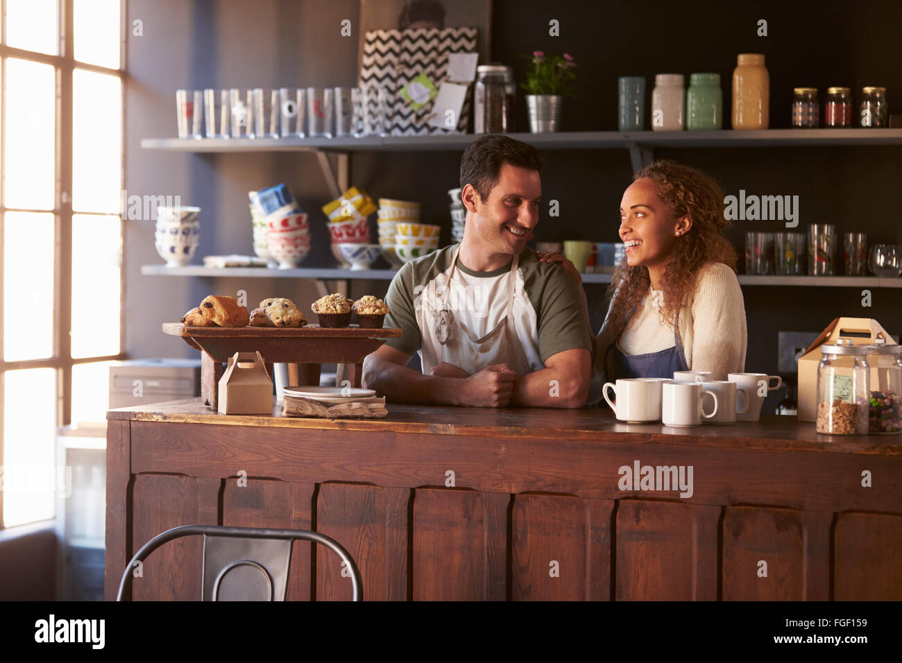 Couple Running Coffee Shop Standing Behind Counter Stock Photo - Alamy