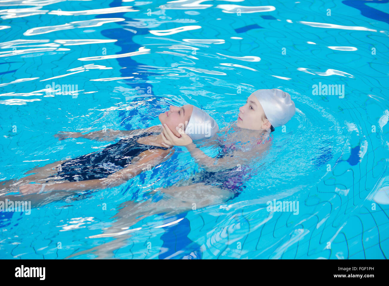 help and rescue on swimming pool Stock Photo - Alamy