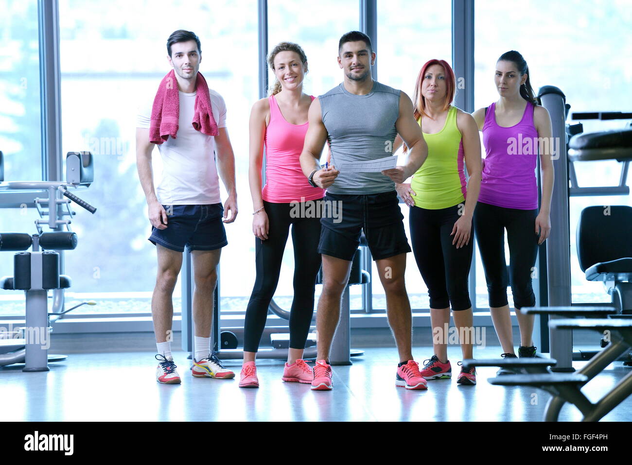 Group of people exercising at the gym Stock Photo - Alamy