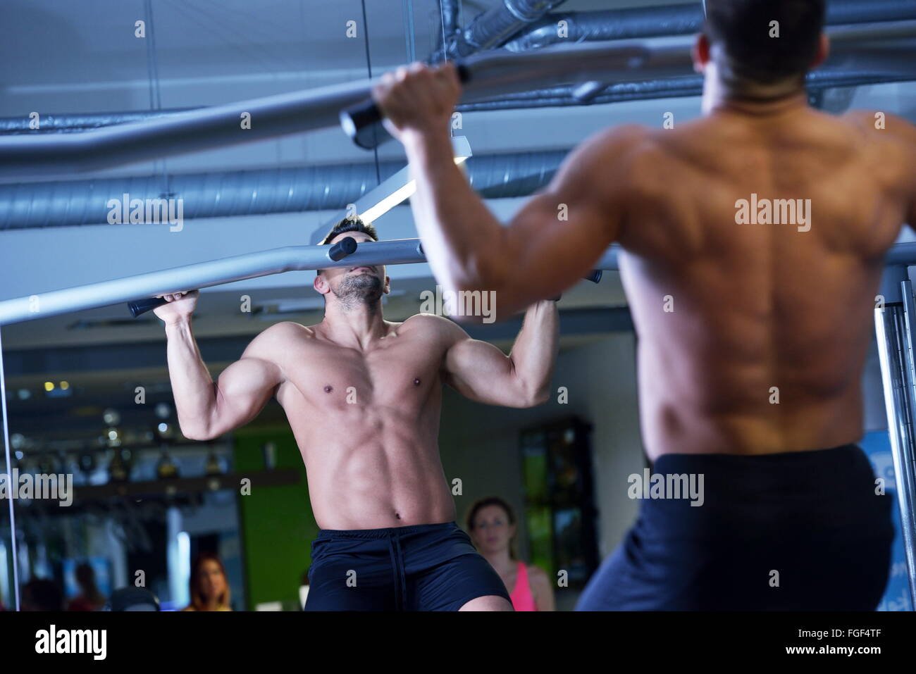 handsome man exercising at the gym Stock Photo - Alamy
