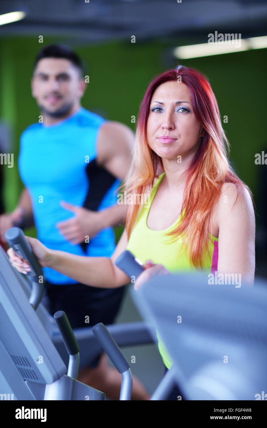 Group of people running on treadmills Stock Photo - Alamy