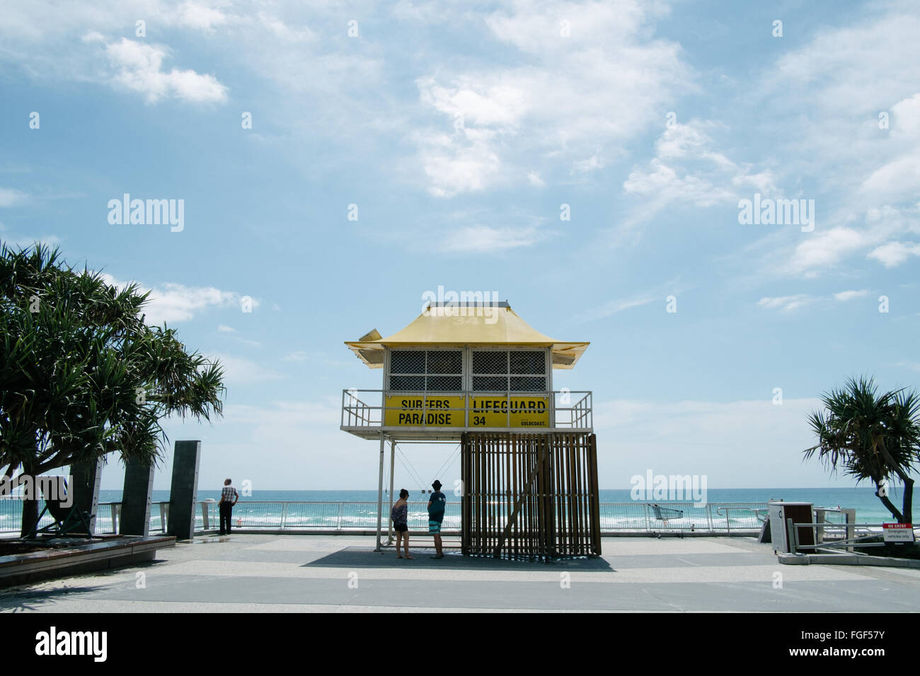 People take shade from the sun near the sea at Surfer's Paradise Stock ...