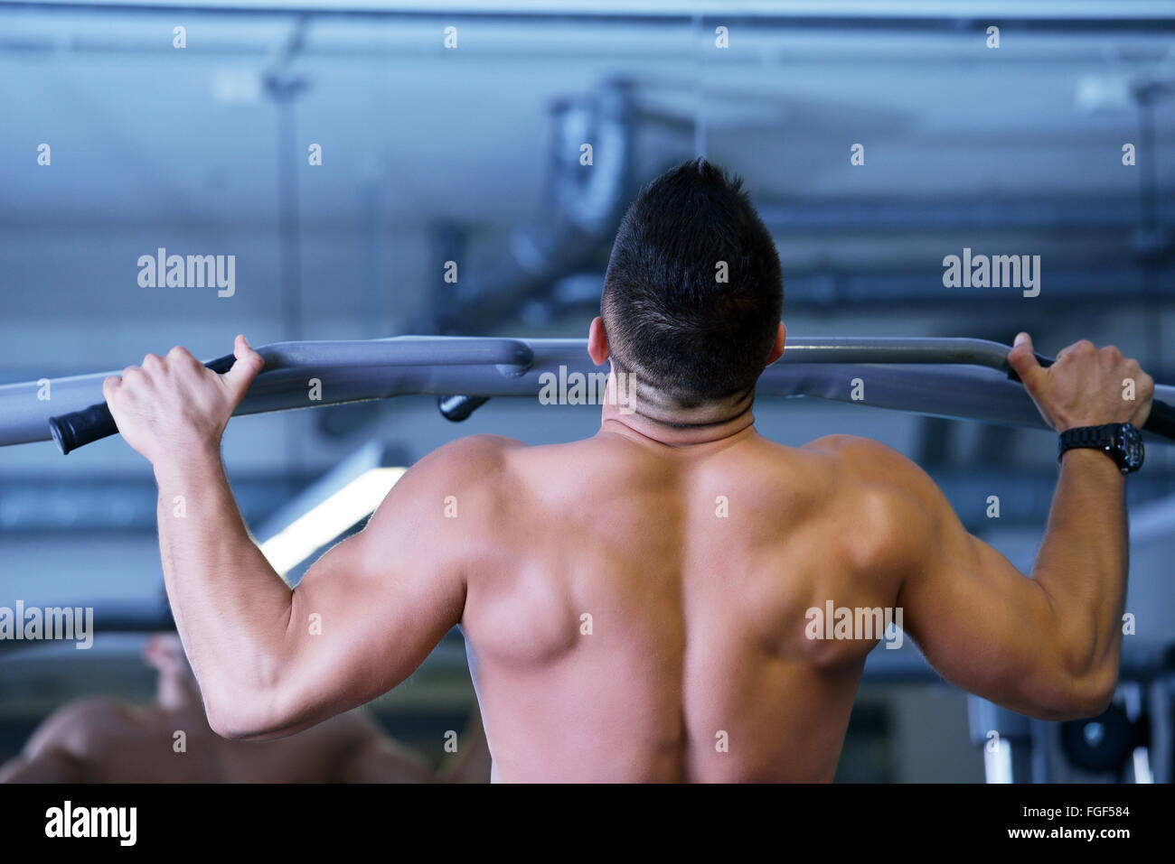 handsome man exercising at the gym Stock Photo - Alamy