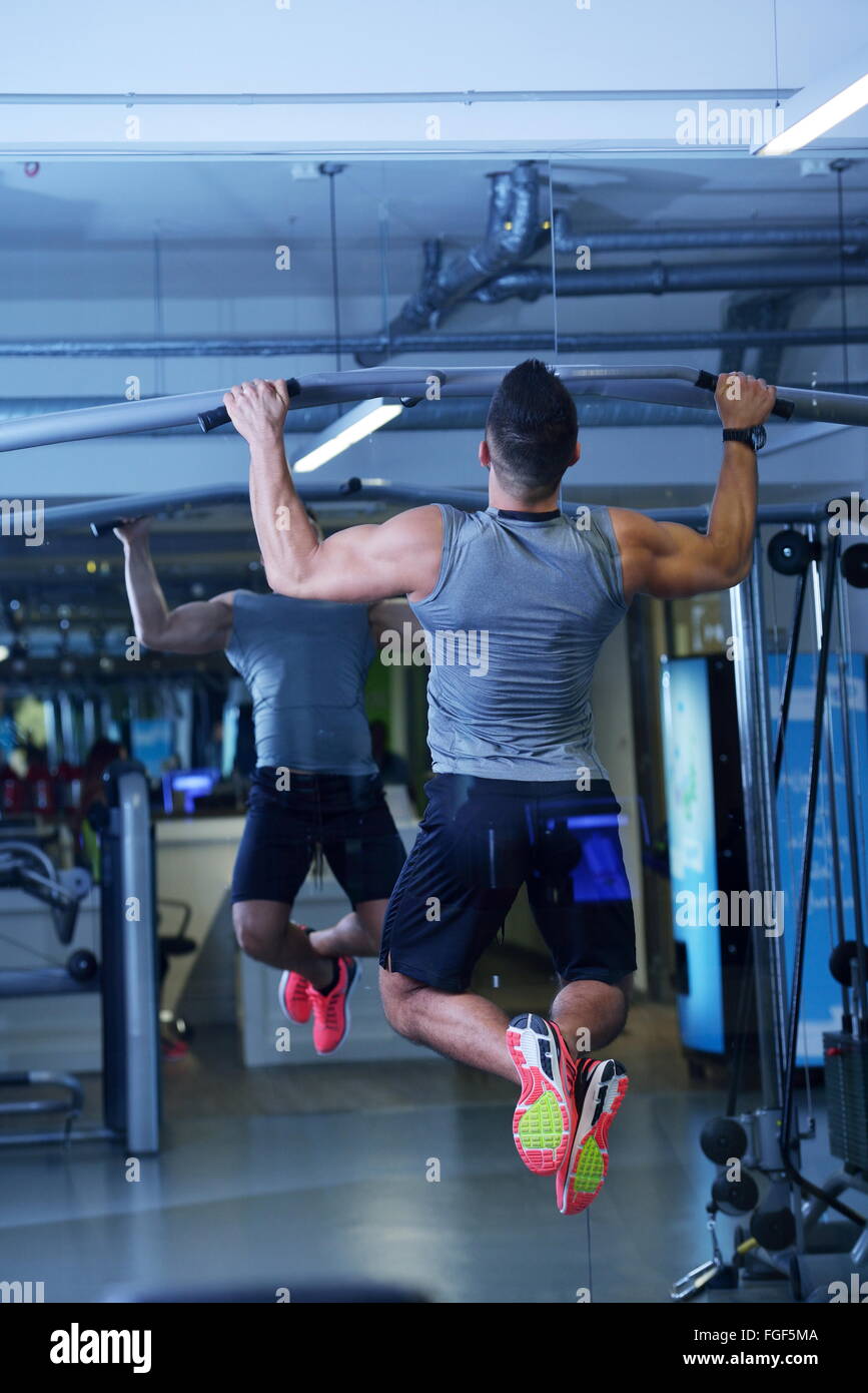 handsome man exercising at the gym Stock Photo - Alamy