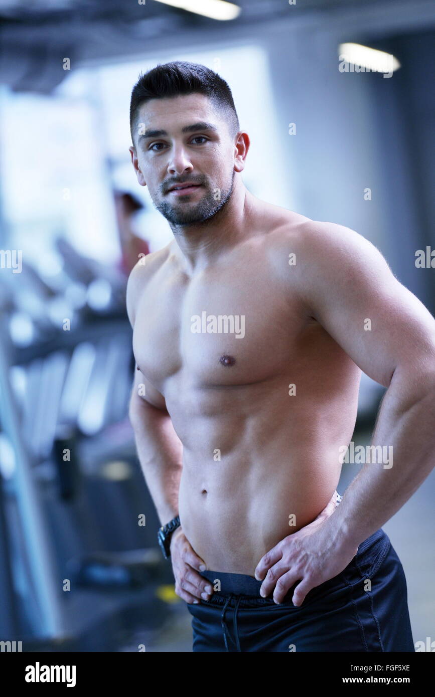 handsome man exercising at the gym Stock Photo - Alamy
