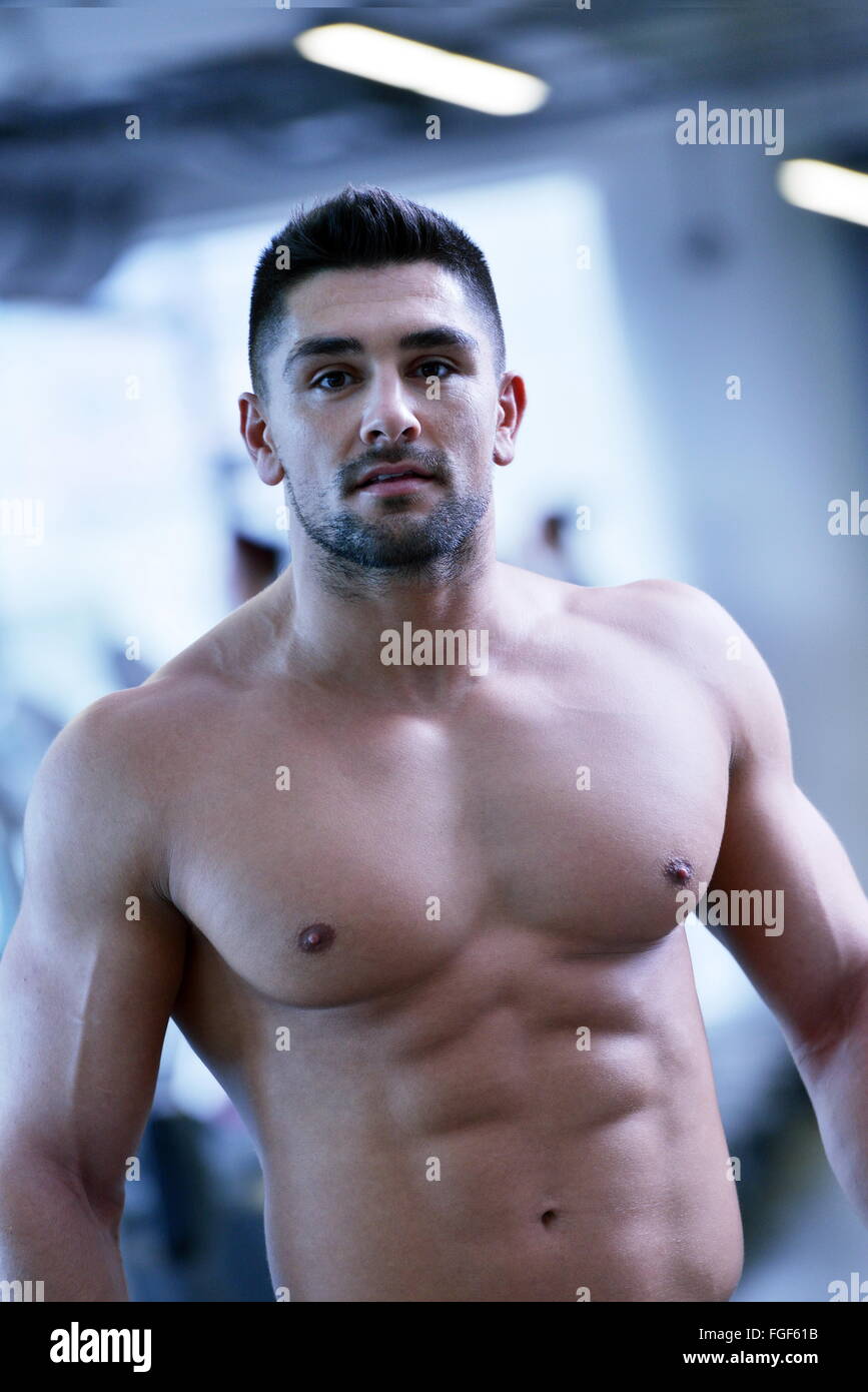 handsome man exercising at the gym Stock Photo - Alamy