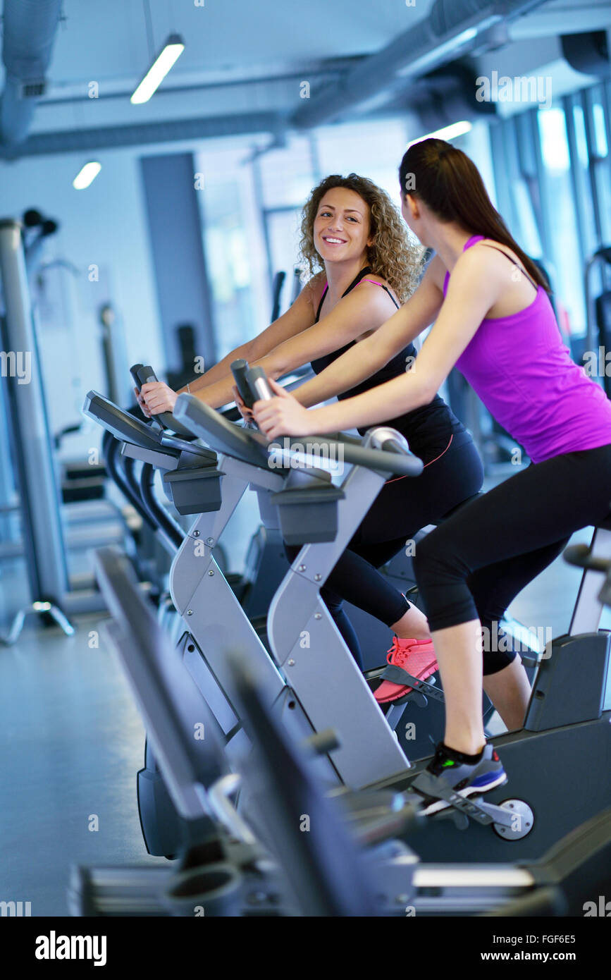 Group of people running on treadmills Stock Photo - Alamy