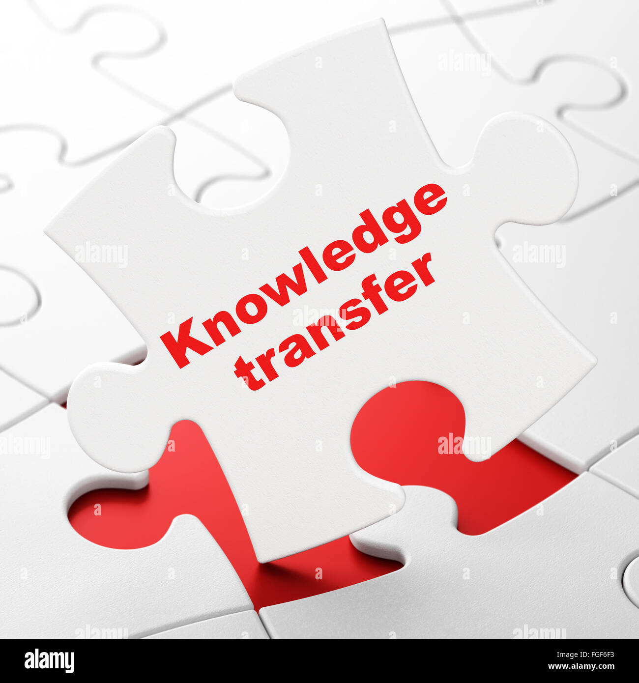 Studying concept: Knowledge Transfer on puzzle background Stock Photo ...