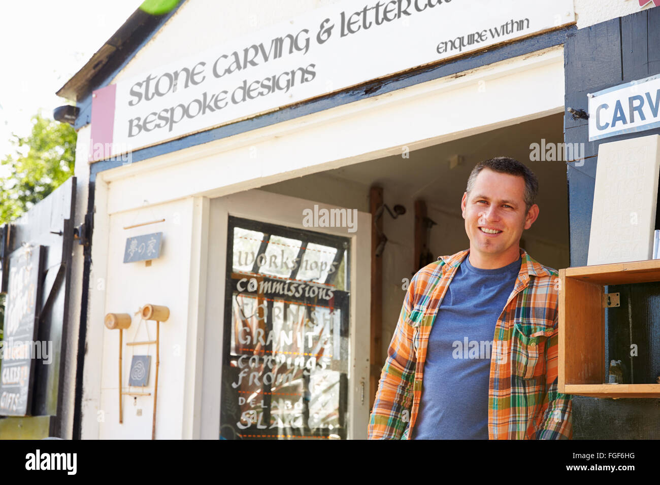 Portrait Of Stone Mason Standing Outside Workshop Stock Photo - Alamy