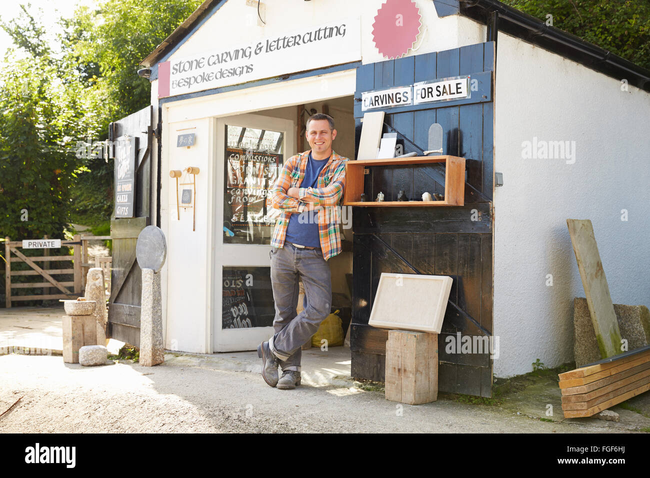 Portrait Of Stone Mason Standing Outside Workshop Stock Photo - Alamy