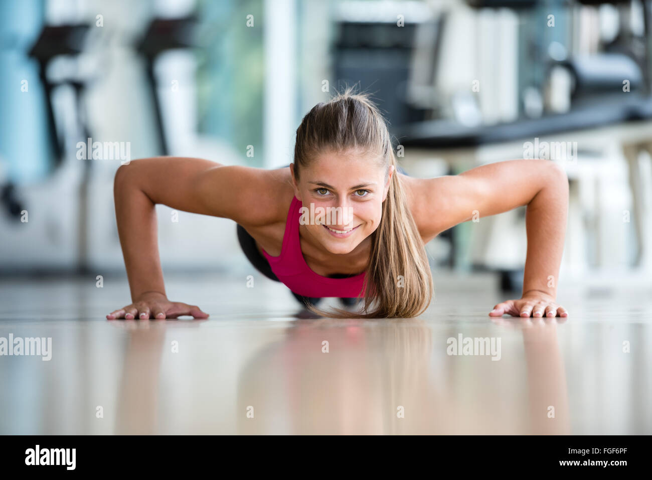 warming up and doing some push ups a the gym Stock Photo - Alamy