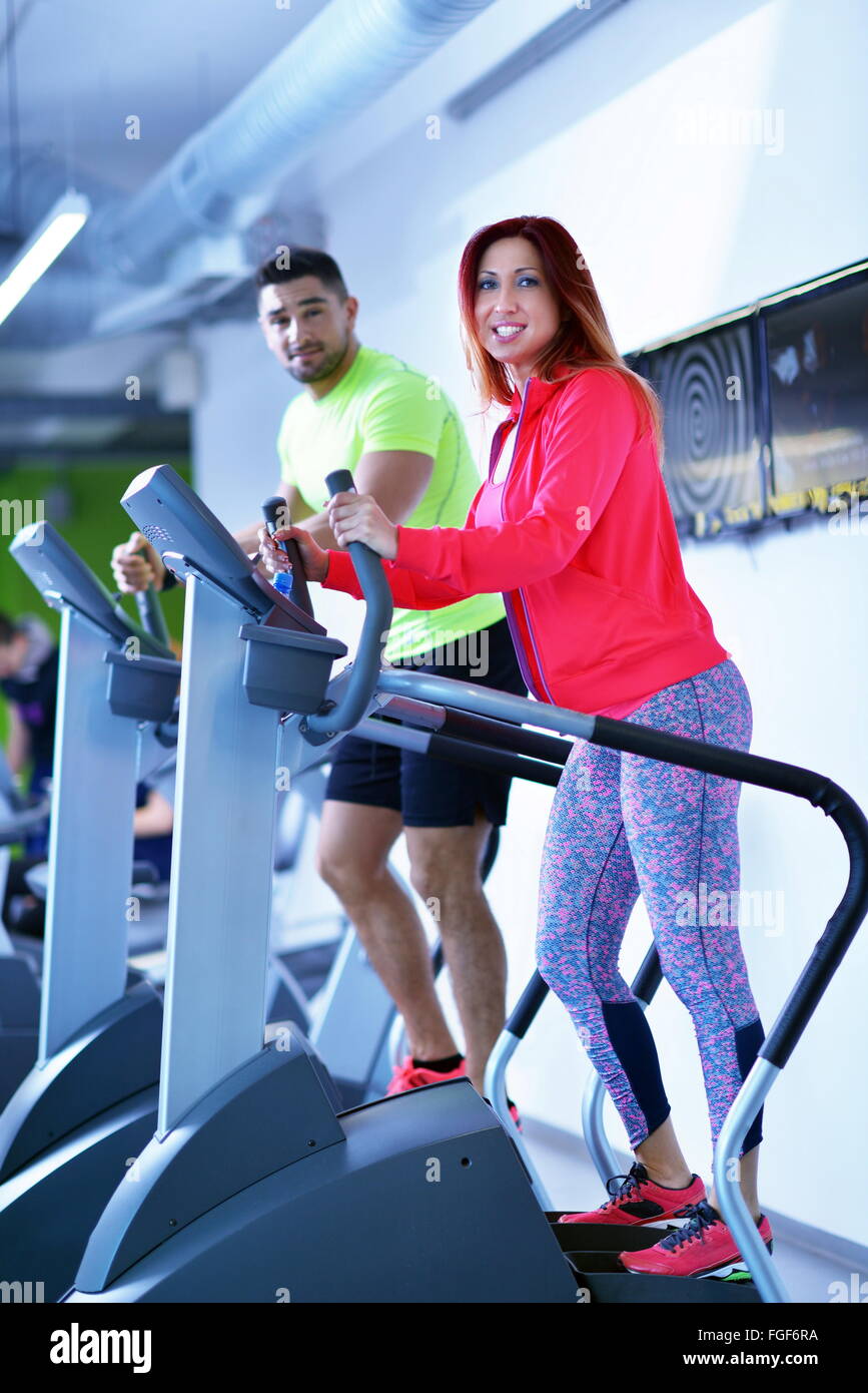 Group of people running on treadmills Stock Photo - Alamy
