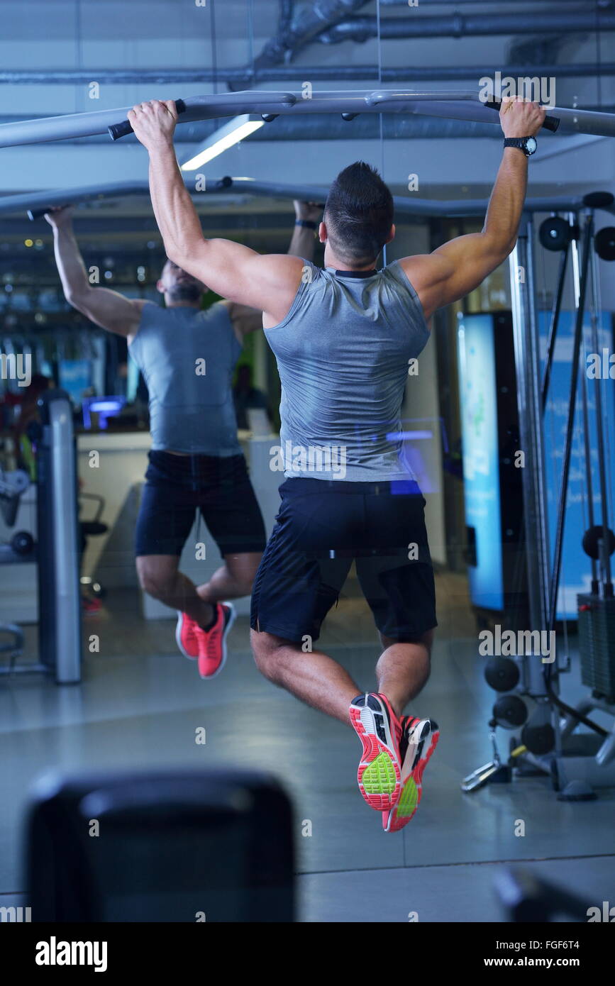 handsome man exercising at the gym Stock Photo - Alamy