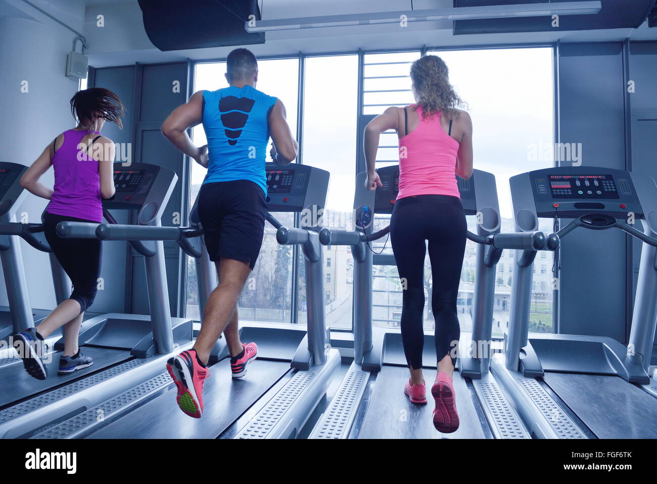 woman exercising on treadmill in gym Stock Photo - Alamy
