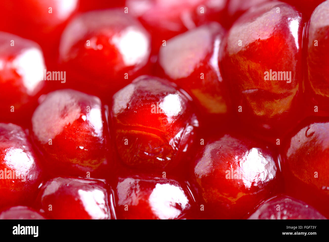 Pomegranate background. Macro of peeled ripe seeds Stock Photo - Alamy