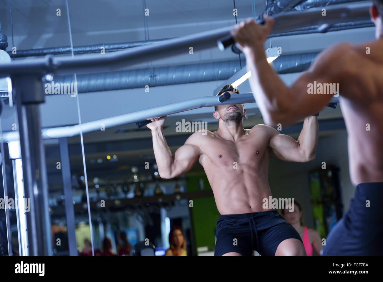 handsome man exercising at the gym Stock Photo - Alamy