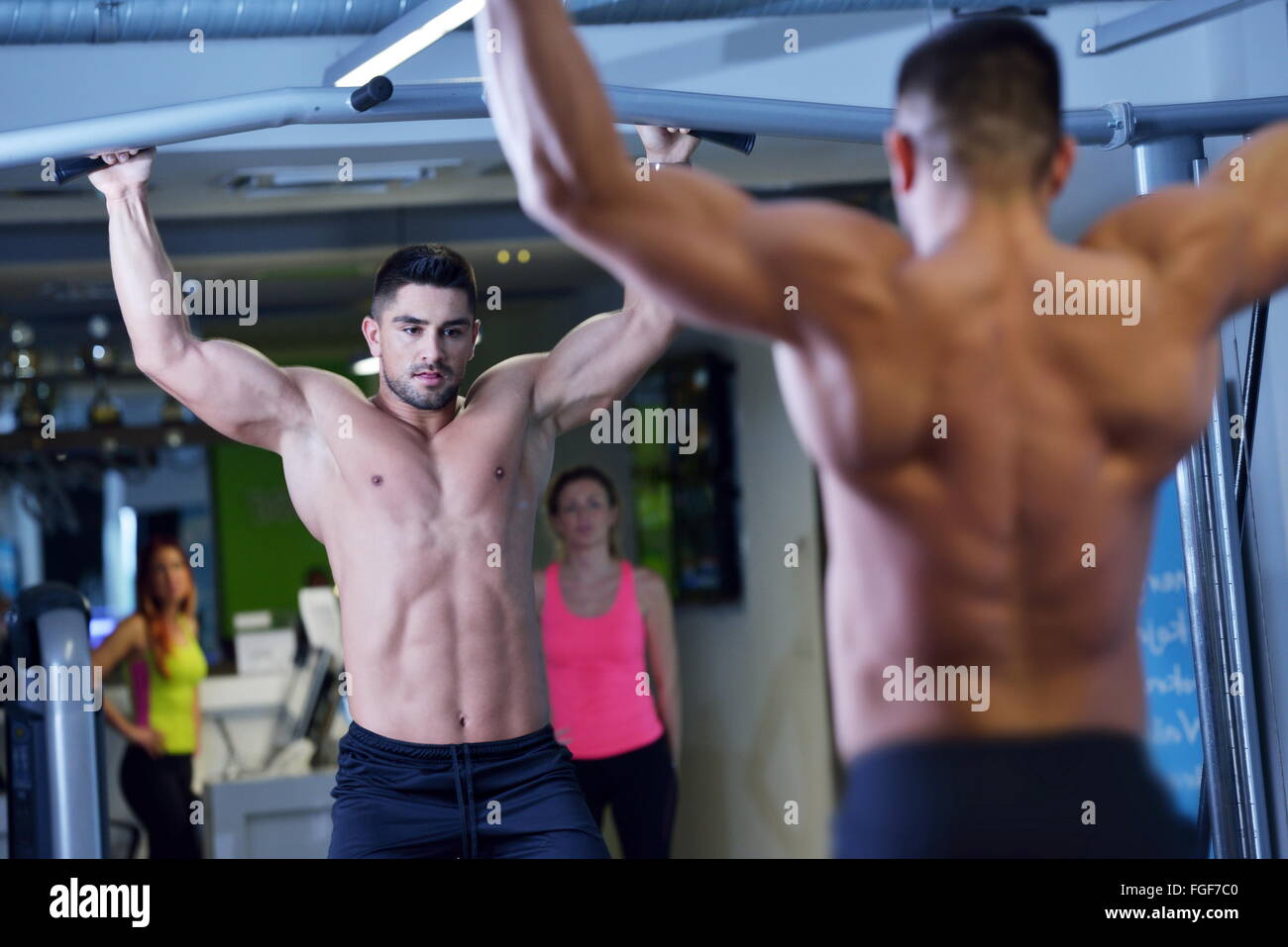 handsome man exercising at the gym Stock Photo - Alamy