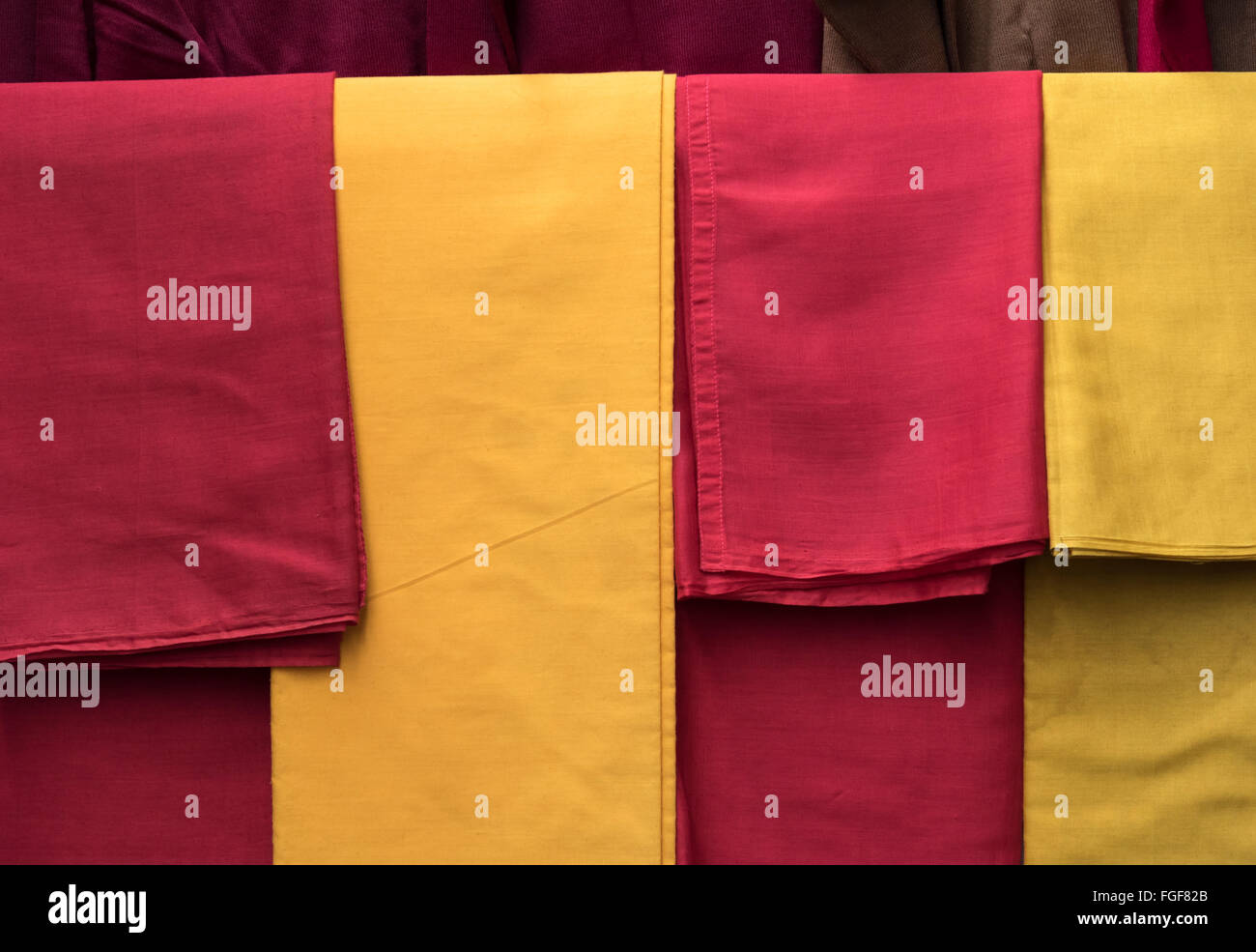 Red and yellow Buddhist monk robes, Burma Stock Photo - Alamy