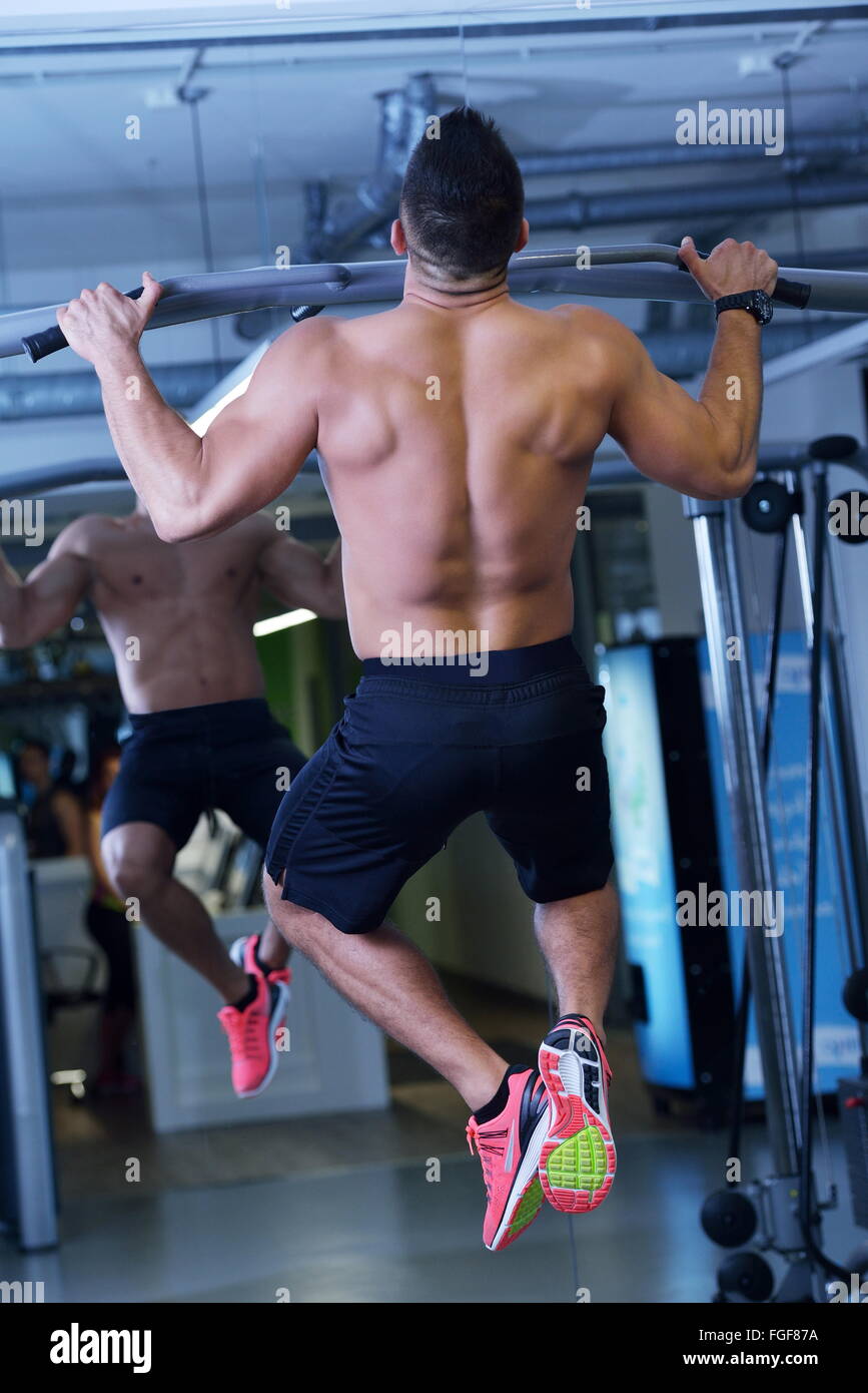 handsome man exercising at the gym Stock Photo - Alamy