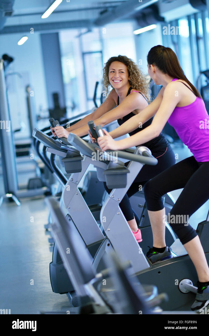 Group of people running on treadmills Stock Photo - Alamy